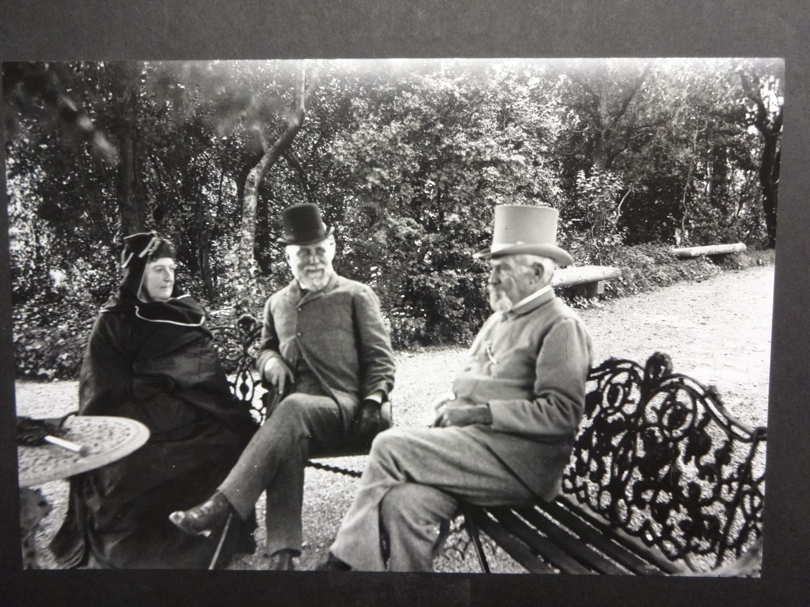 Sir Richard and Isabel Burton and another man sitting in the garden at ...